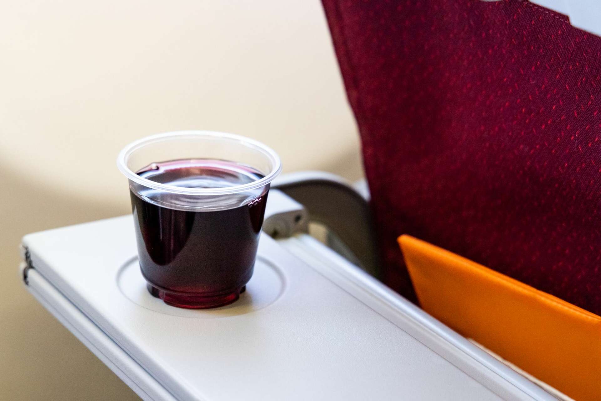 Here’s what you should and should not drink on a plane, according to ...