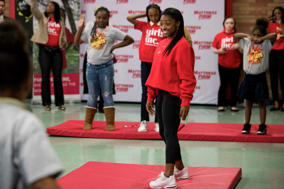 Olympic gold medalist Simone Biles surprises Houston elementary students