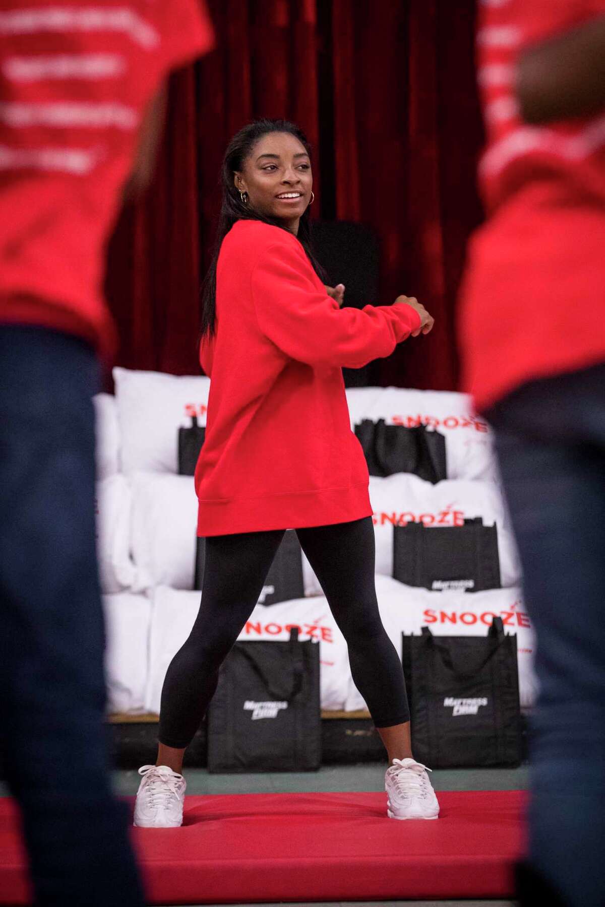 Olympic gold medalist Simone Biles surprises Houston elementary students