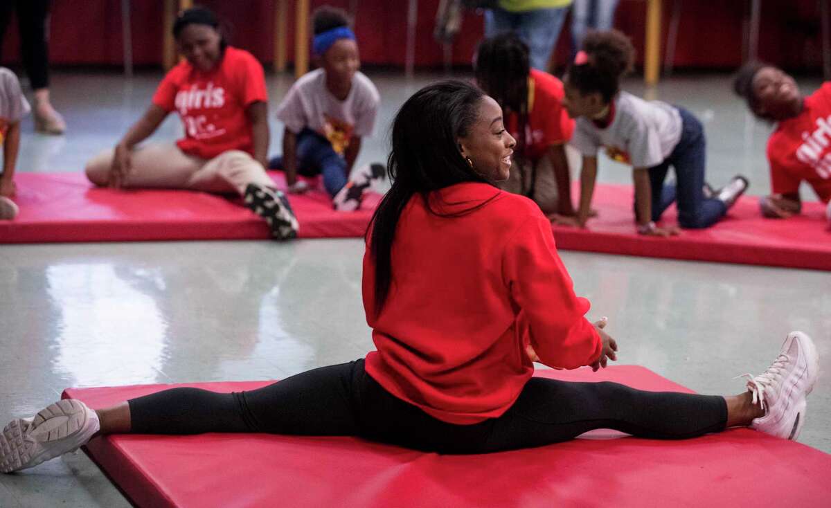 Olympic gold medalist Simone Biles surprises Houston elementary students