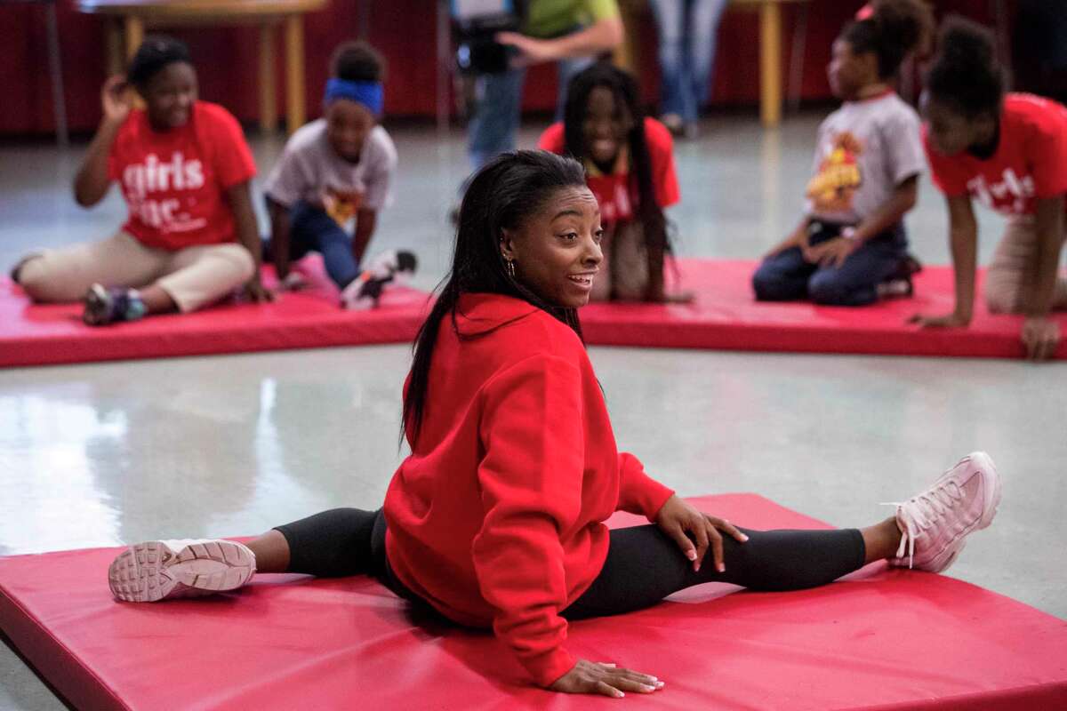 Olympic gold medalist Simone Biles surprises Houston elementary students