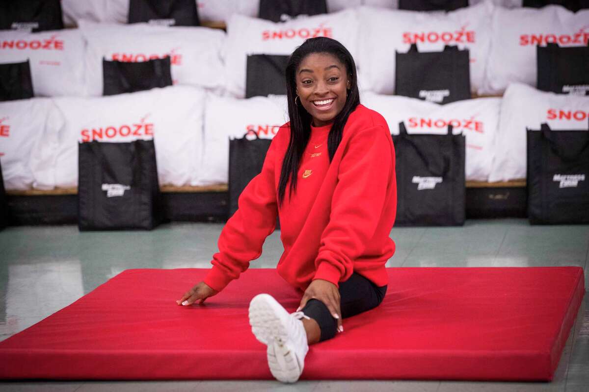 Olympic gold medalist Simone Biles surprises Houston elementary students