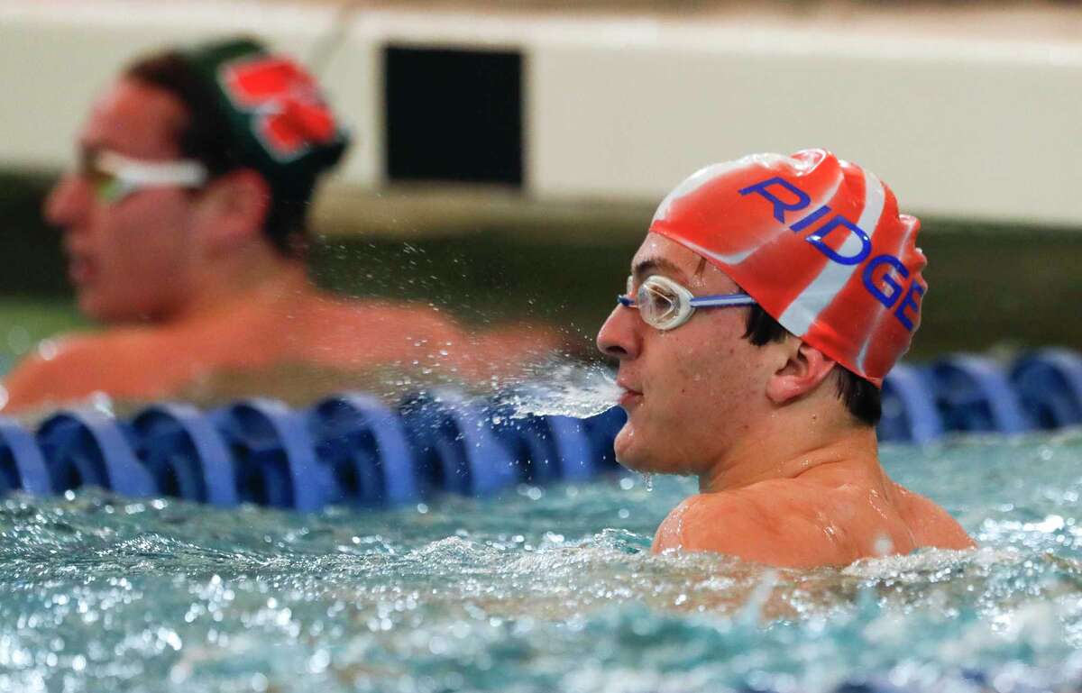 SWIMMING: The Woodlands dominates District 13-6A