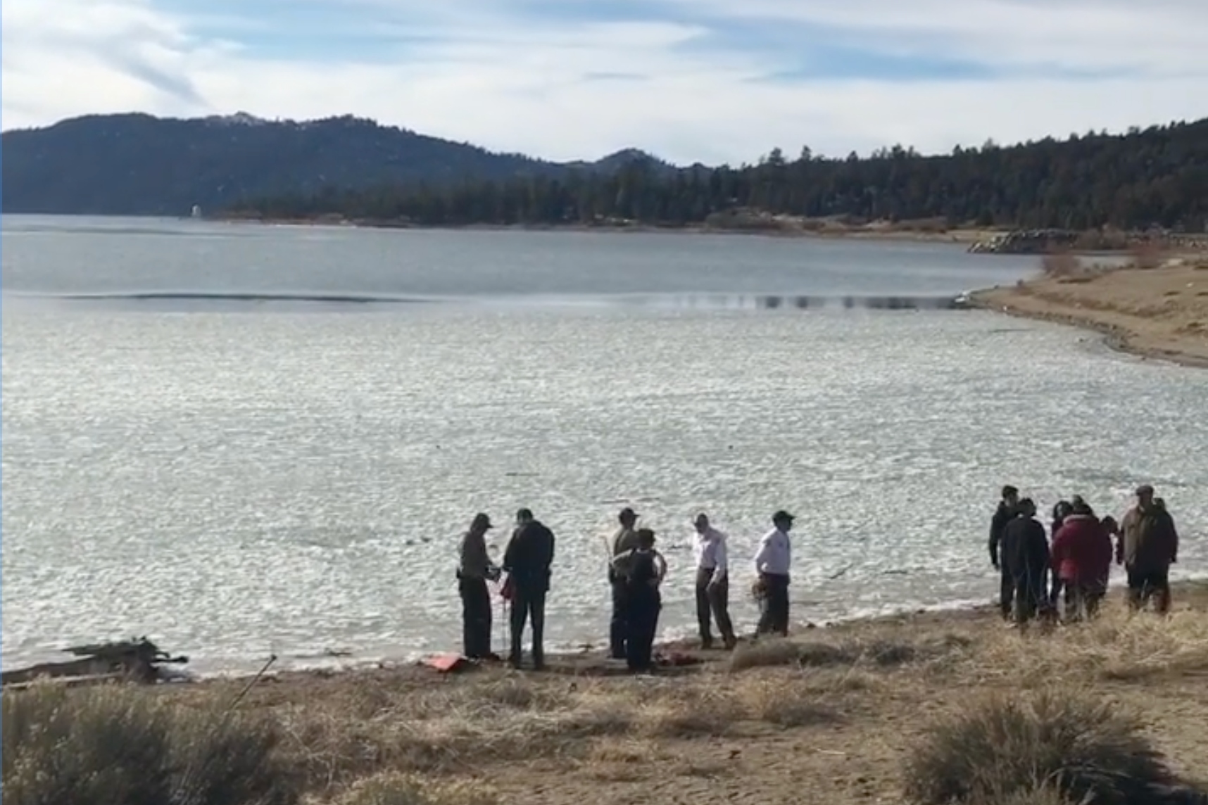 California family falls through ice into frozen lake