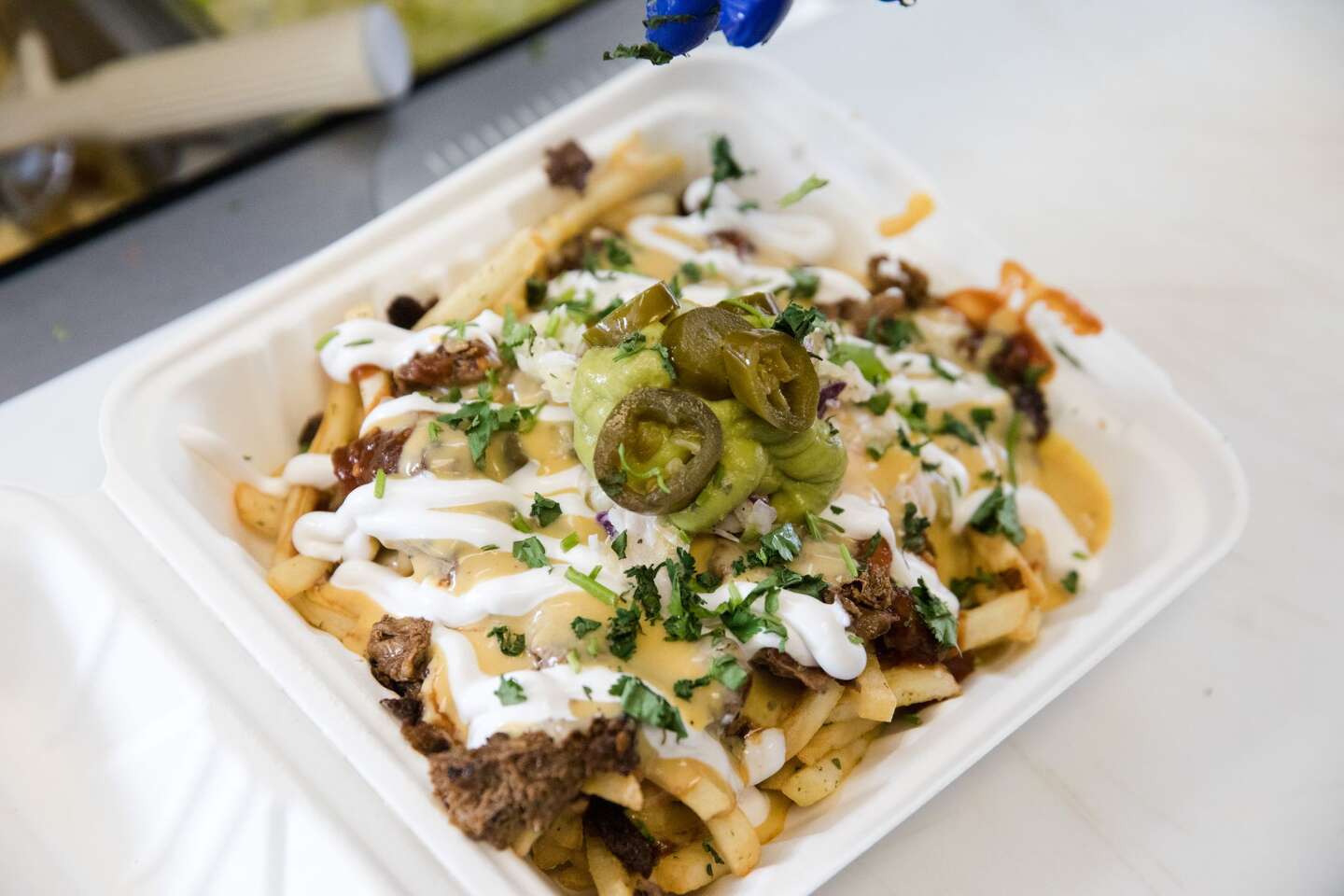 Former rapper's latest hit is serving vegan BBQ with a side of dance videos