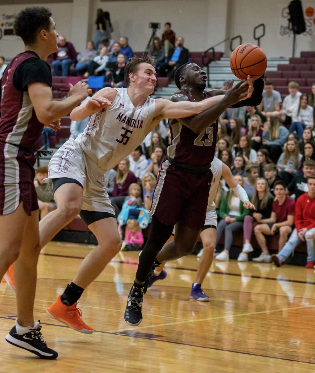 BOYS HOOPS: A&M Consolidated takes 19-5A win over Magnolia