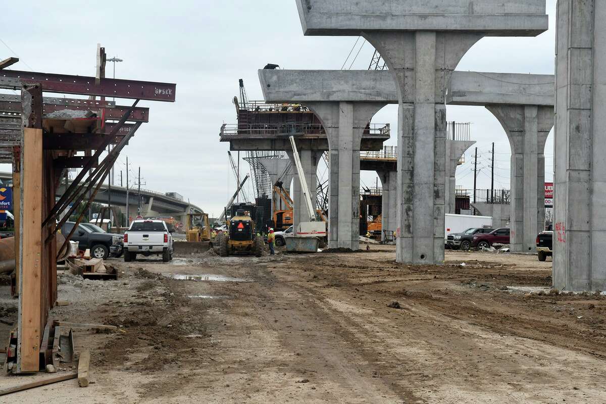 Businesses near construction of FM 1960/Hwy. 6 bridge over U.S. 290 ...