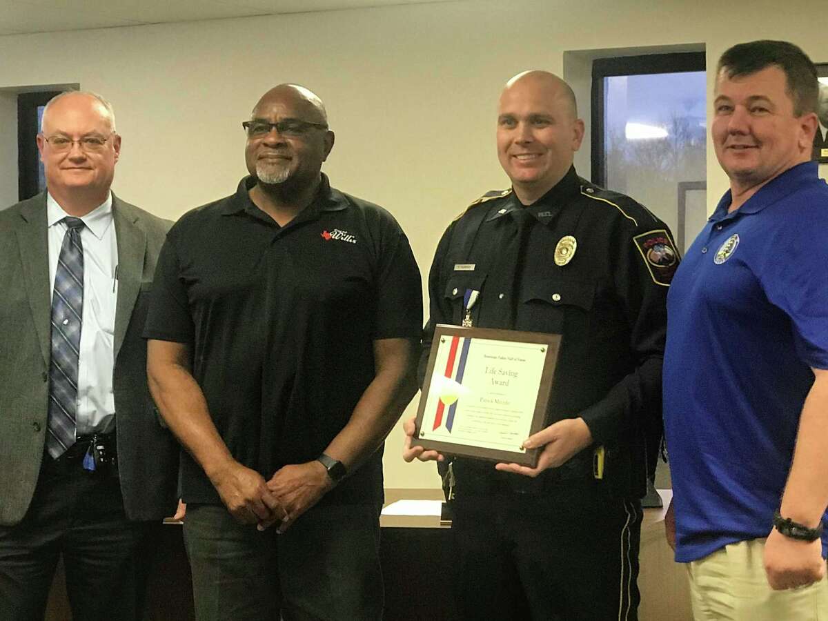 Willis officers honored for rescuing woman trapped in overturned car in ...
