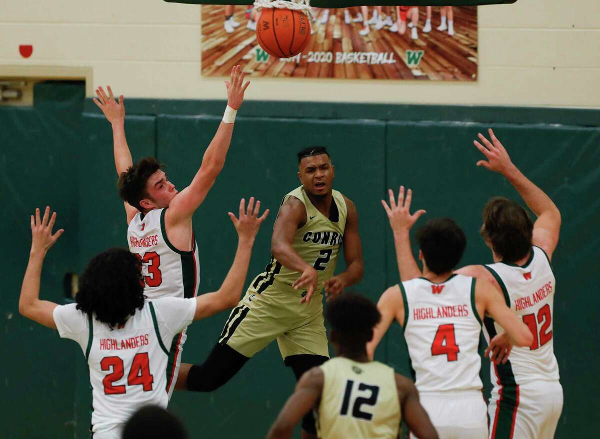 BOYS HOOPS: The Woodlands pulls past Conroe for crucial district win