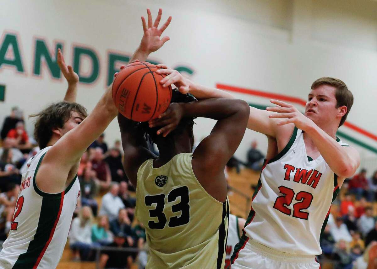 BOYS HOOPS: The Woodlands pulls past Conroe for crucial district win