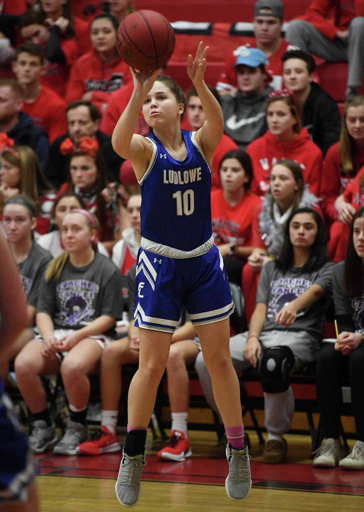 Bucher, Ludlowe hold on for win over Warde