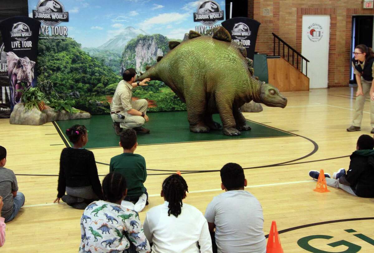 See kids go wild over animatronic baby stegosaurus