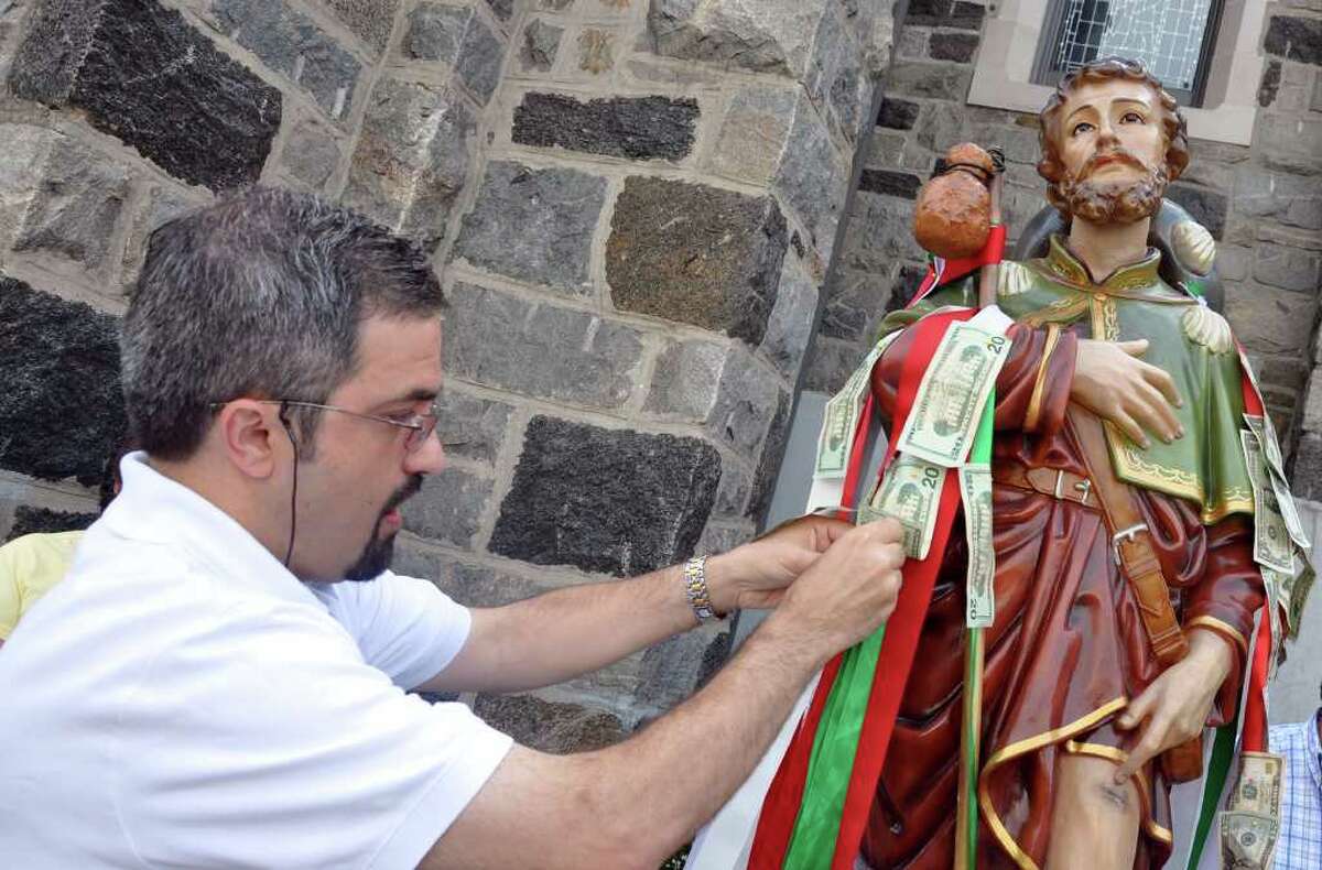 Festival ends with a traditional procession and an Italian-language mass