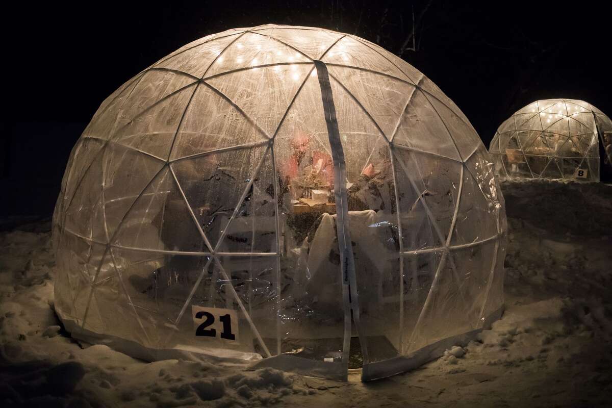 Diners enjoy eight-course meal inside heated igloos during Eat Great Winter