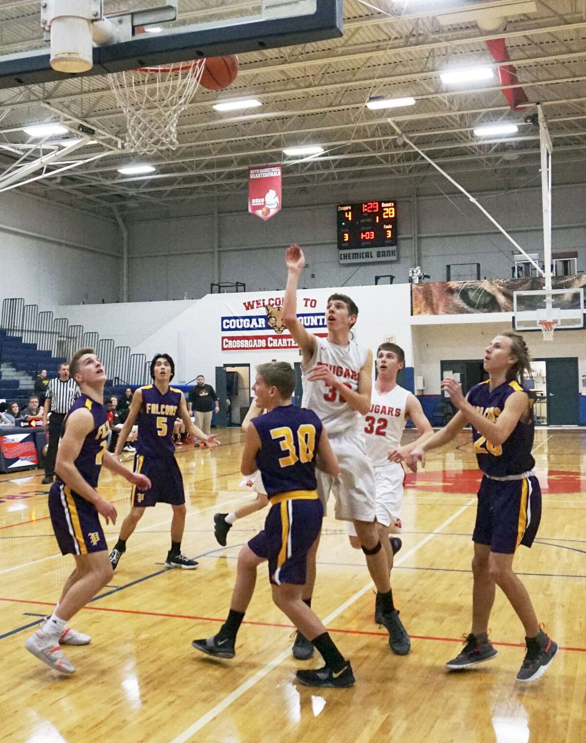 Crossroads Cougars taken down 77-35 by high-flying Pentwater Falcons