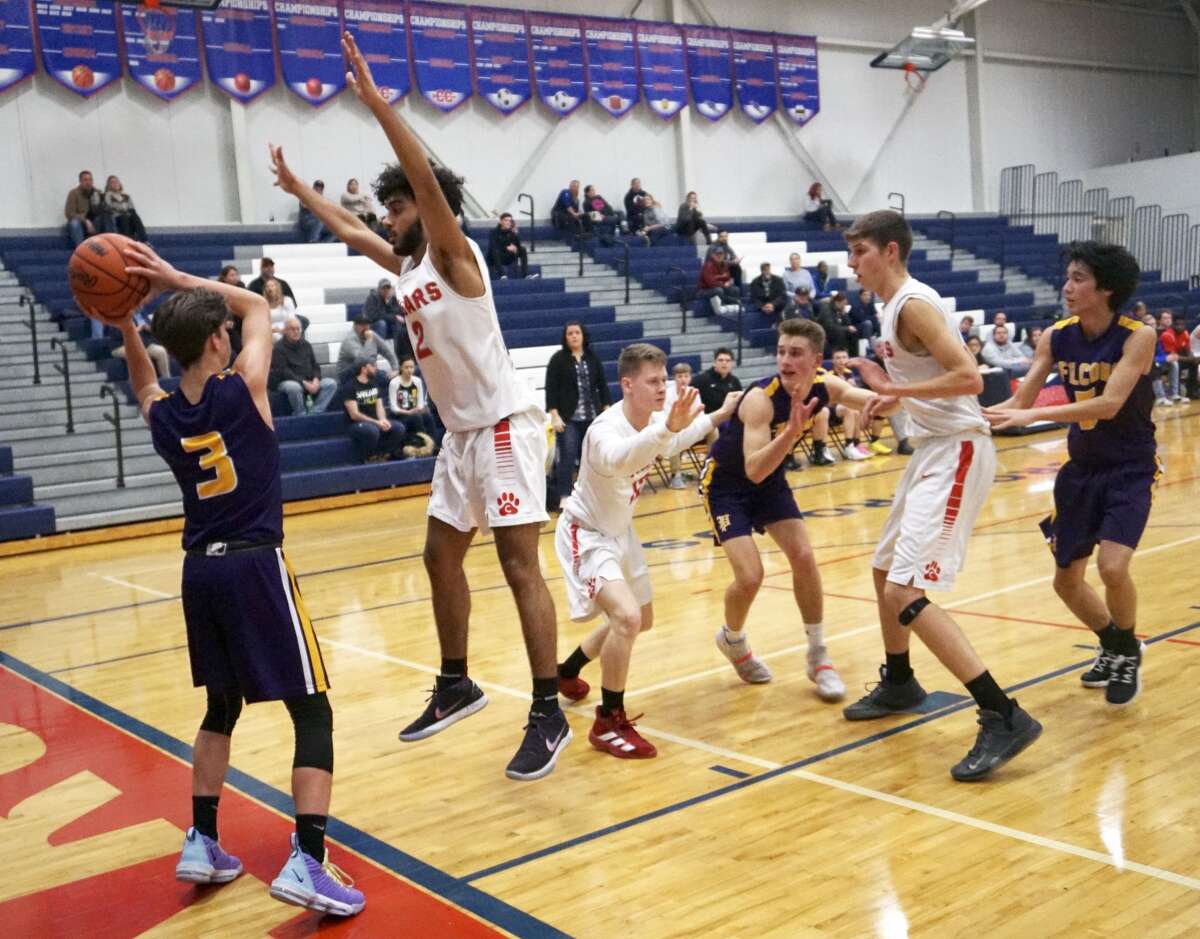 Crossroads Cougars taken down 77-35 by high-flying Pentwater Falcons