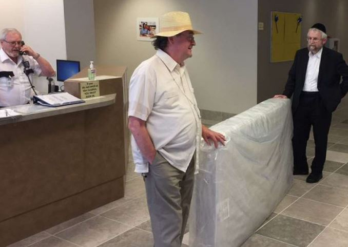 State worker, PEF union activist reinstated with $235,000 back pay