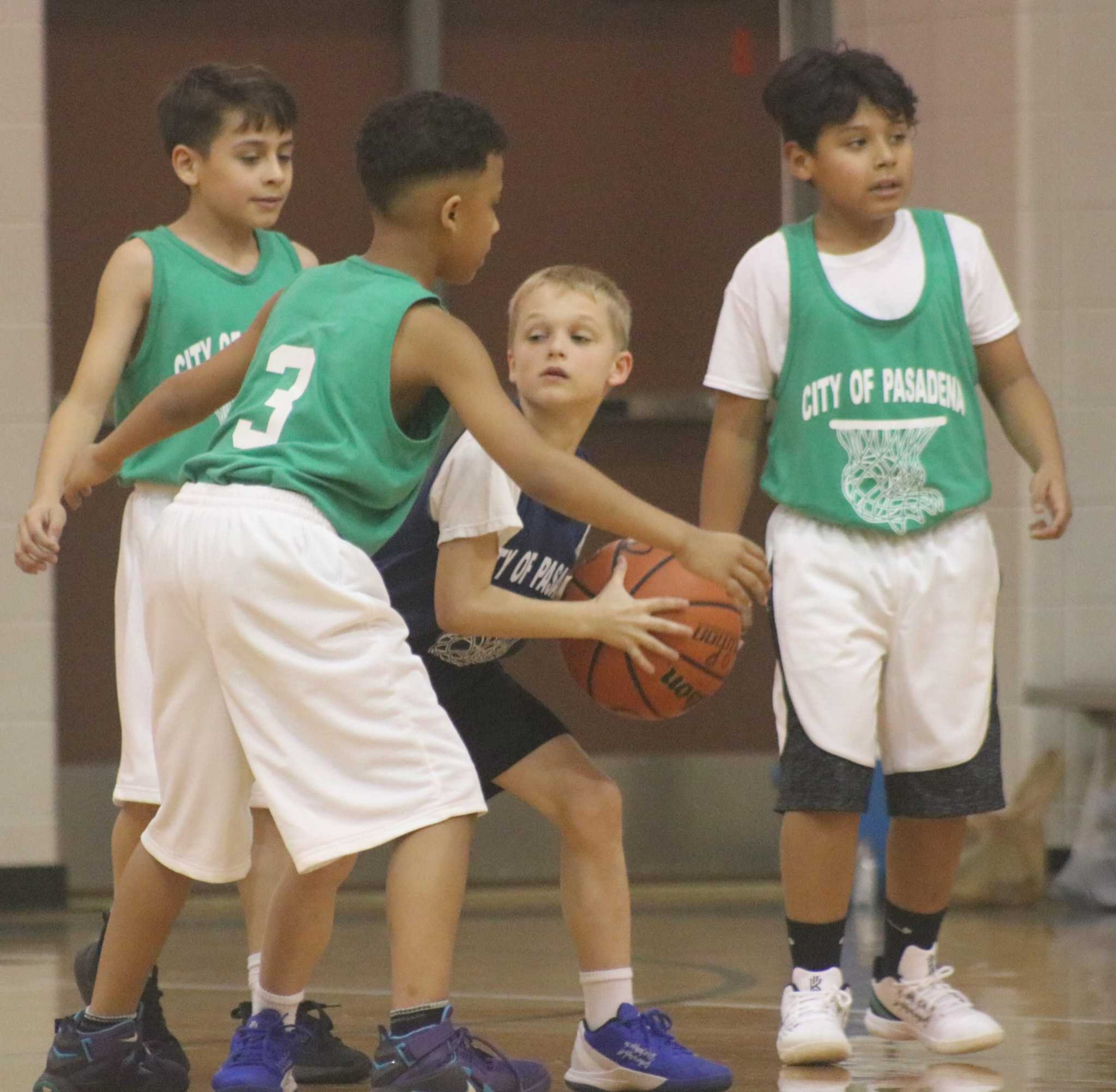 City’s pint-size basketball players compete in 38 playoff games Saturday