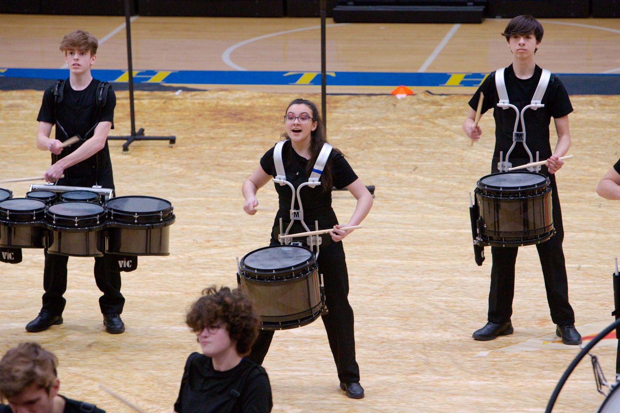 Winter Guard and Percussion ensembles perform