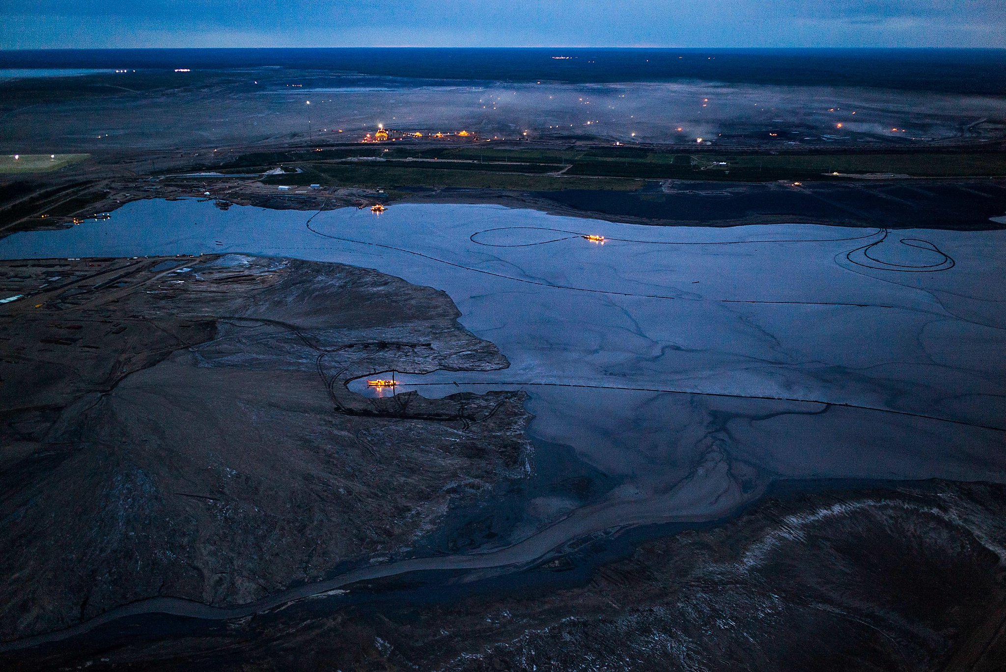 Exxon erases oil sands as reserves plummet