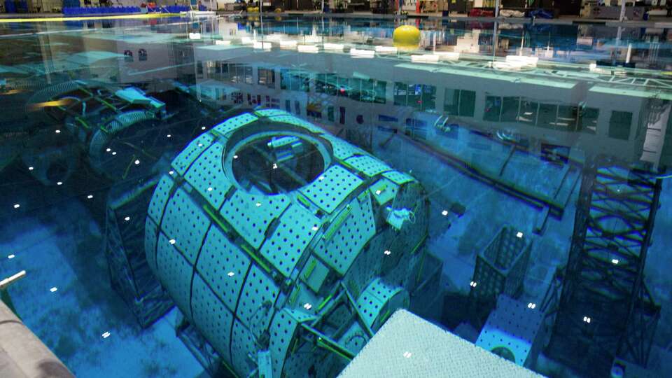 Photo essay: How do NASA astronauts train for spacewalks? In a giant ...