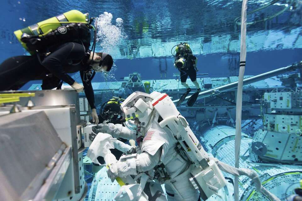 Photo essay: How do NASA astronauts train for spacewalks? In a giant ...