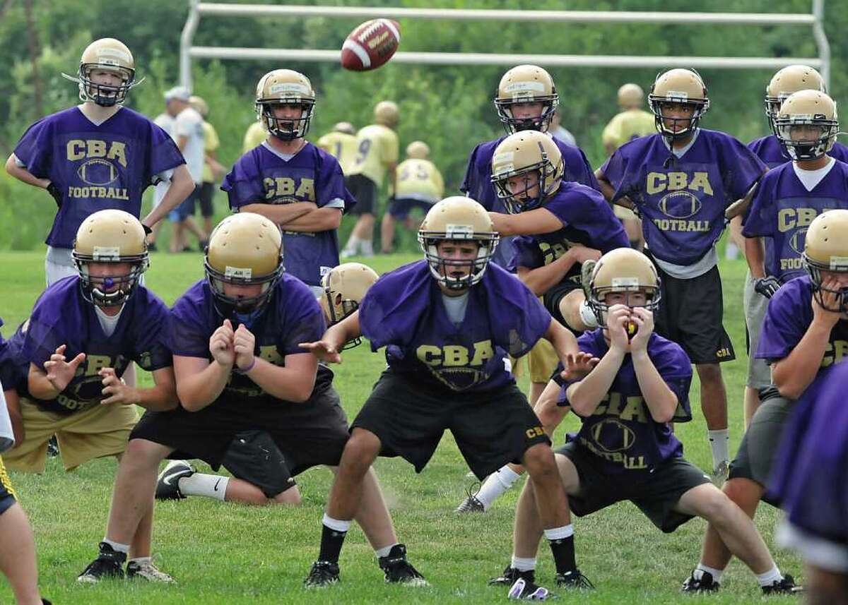 In photos: Opening day of high school football practice