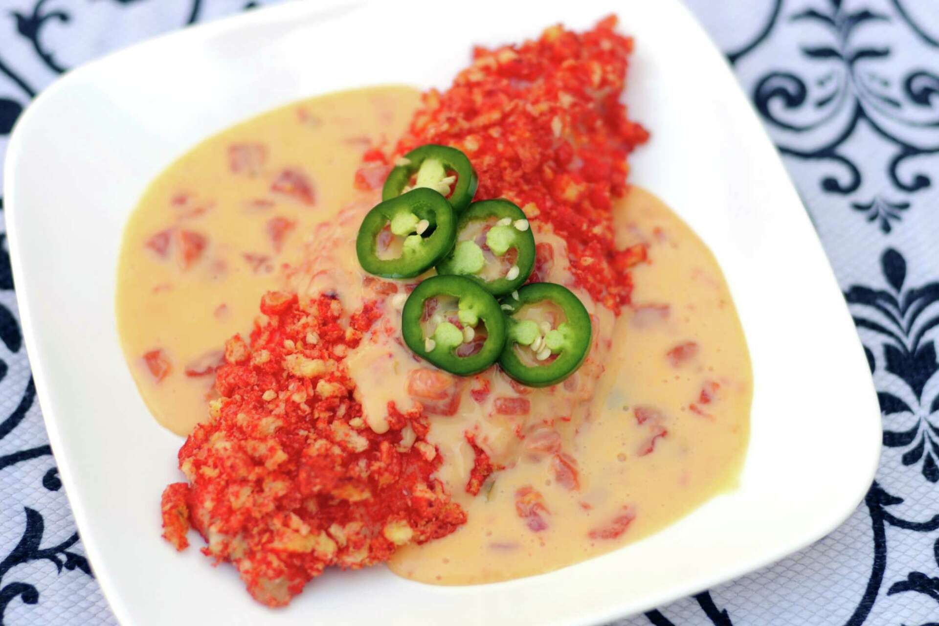 Recipe: Baked Flamin’ Hot Cheetos Catfish with Queso