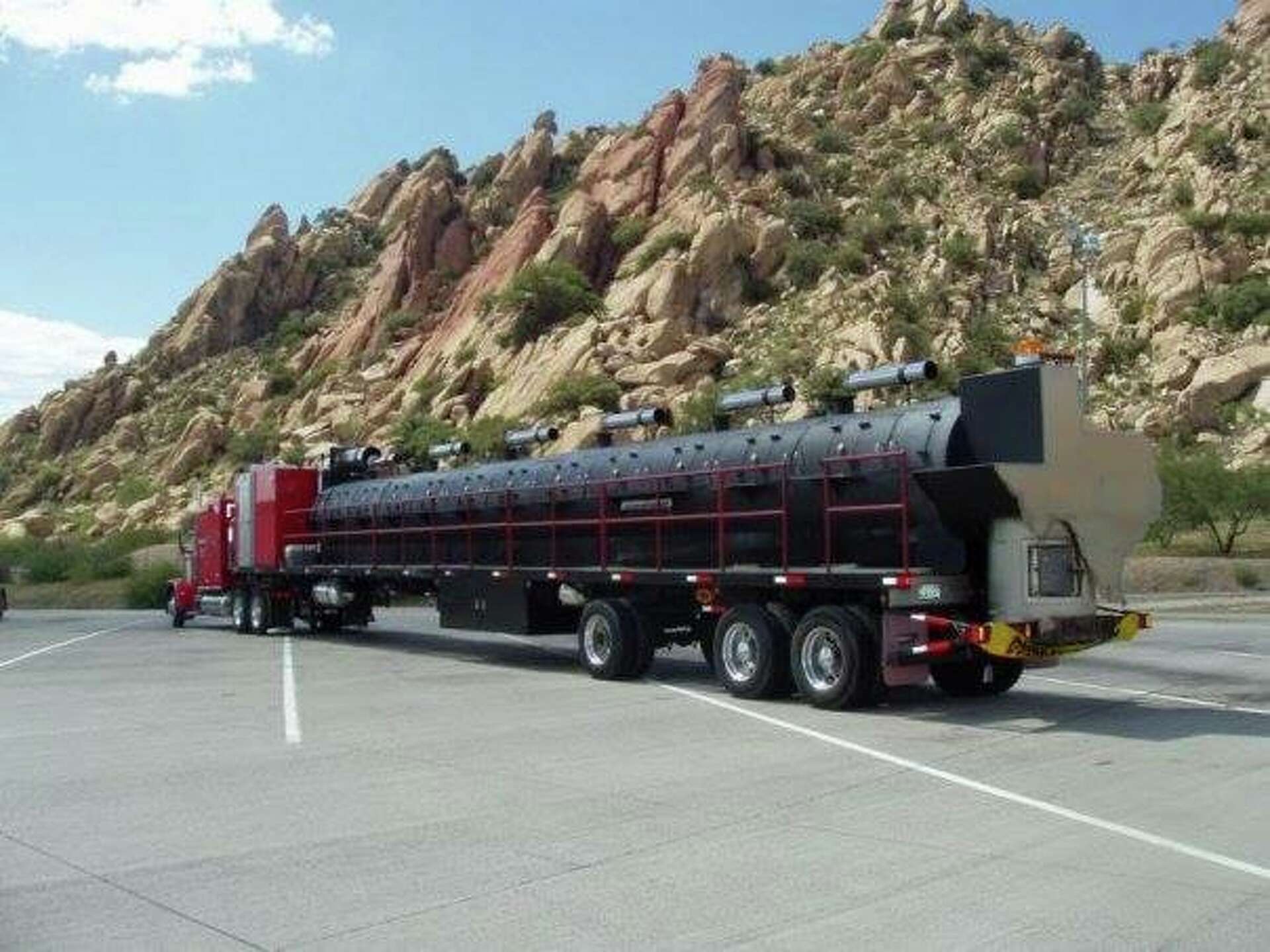 Texas trucker hauls world's largest mobile barbecue smoker