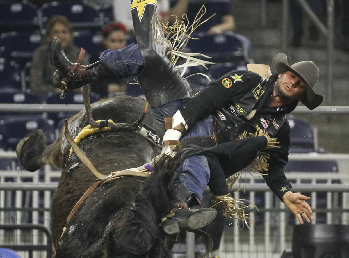 Saddle bronc rider Rusty Wright was down, but he wasn’t out