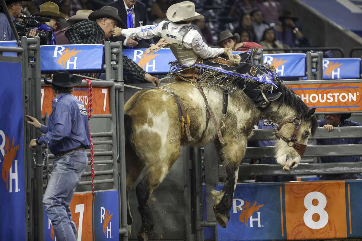 Saddle bronc rider Rusty Wright was down, but he wasn’t out