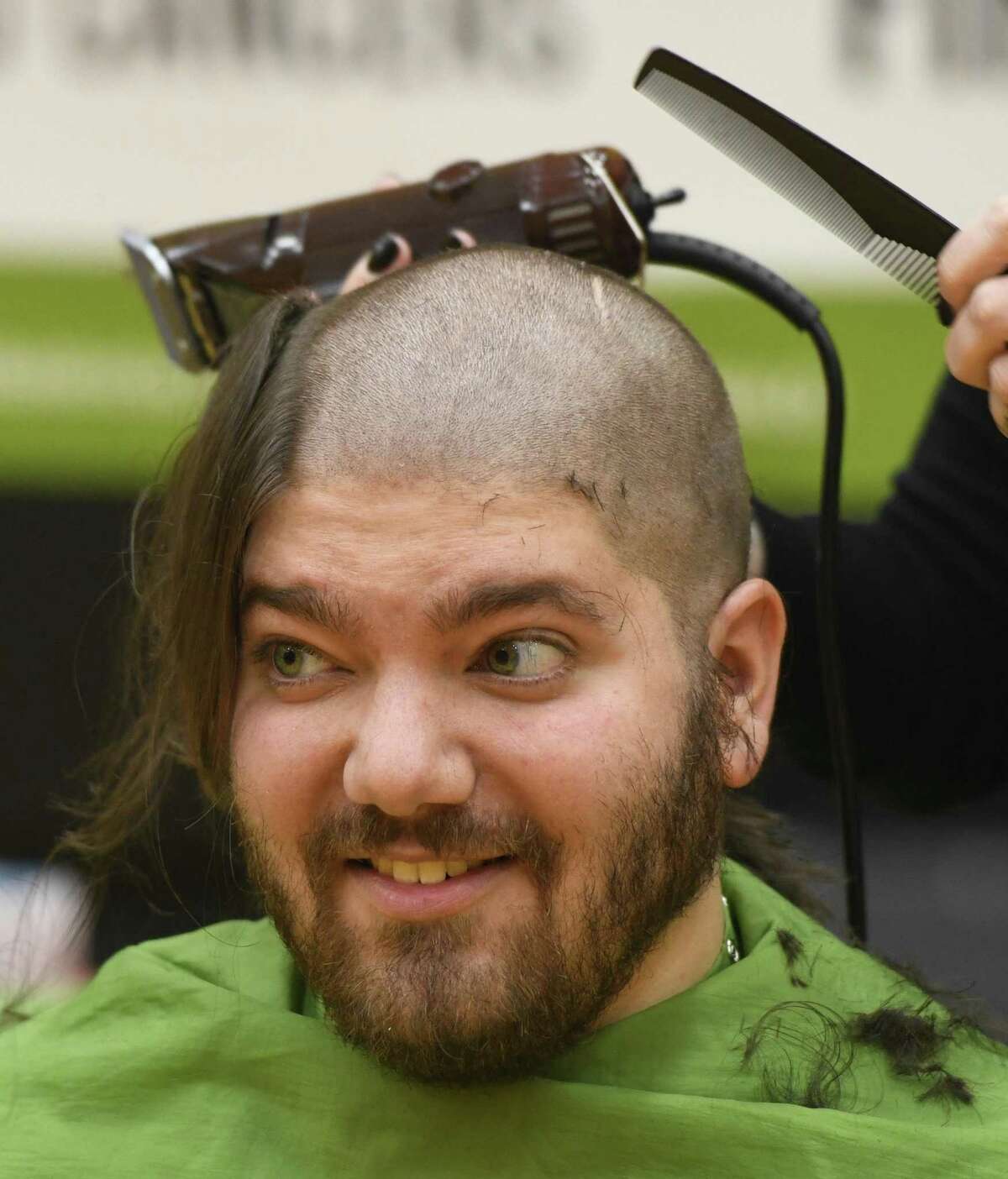 Heads are shaved at Western M.S. for cancer research