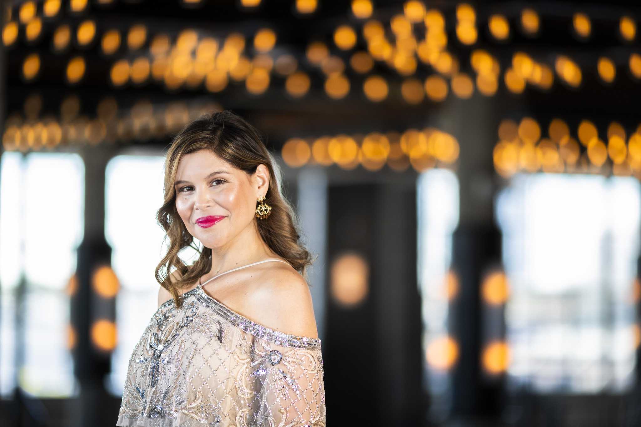 Best Dressed honoree Estela Cockrell, founder of Switch2Pure, is ...