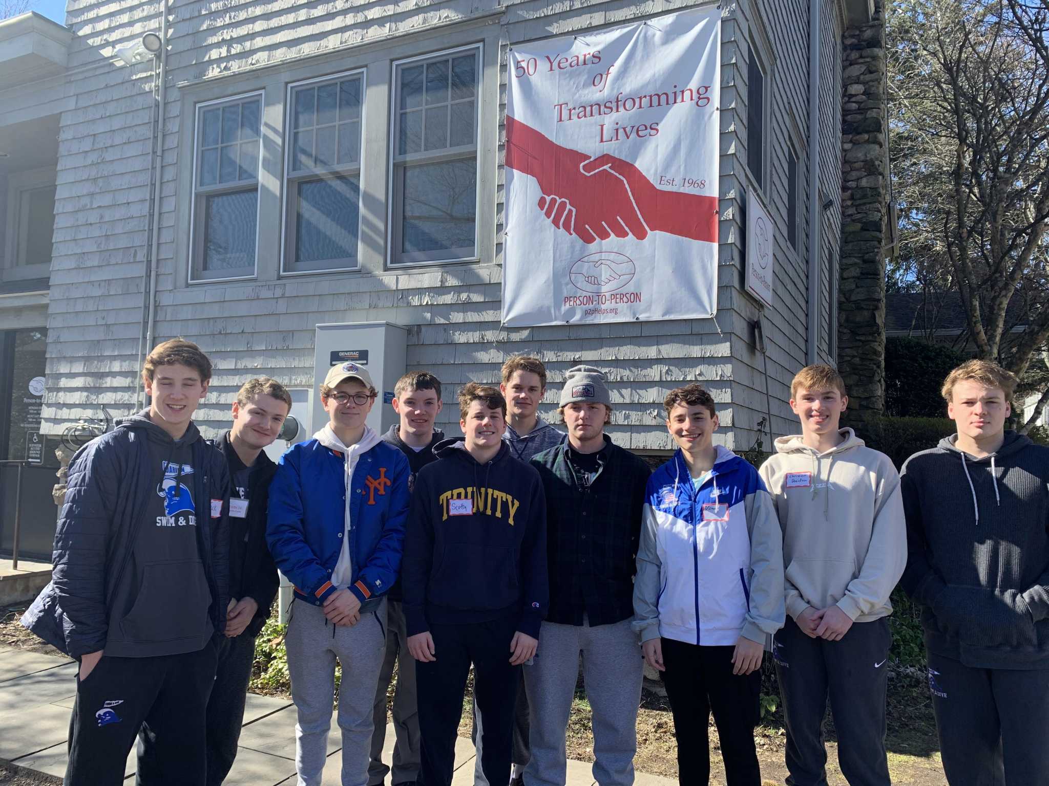 Darien swimmers and divers give to Person-to-Person