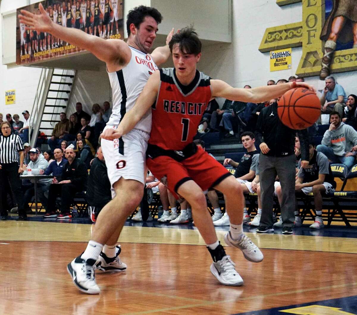 Reed City boys battle but fall 49-28 to Ludington in semifinal round