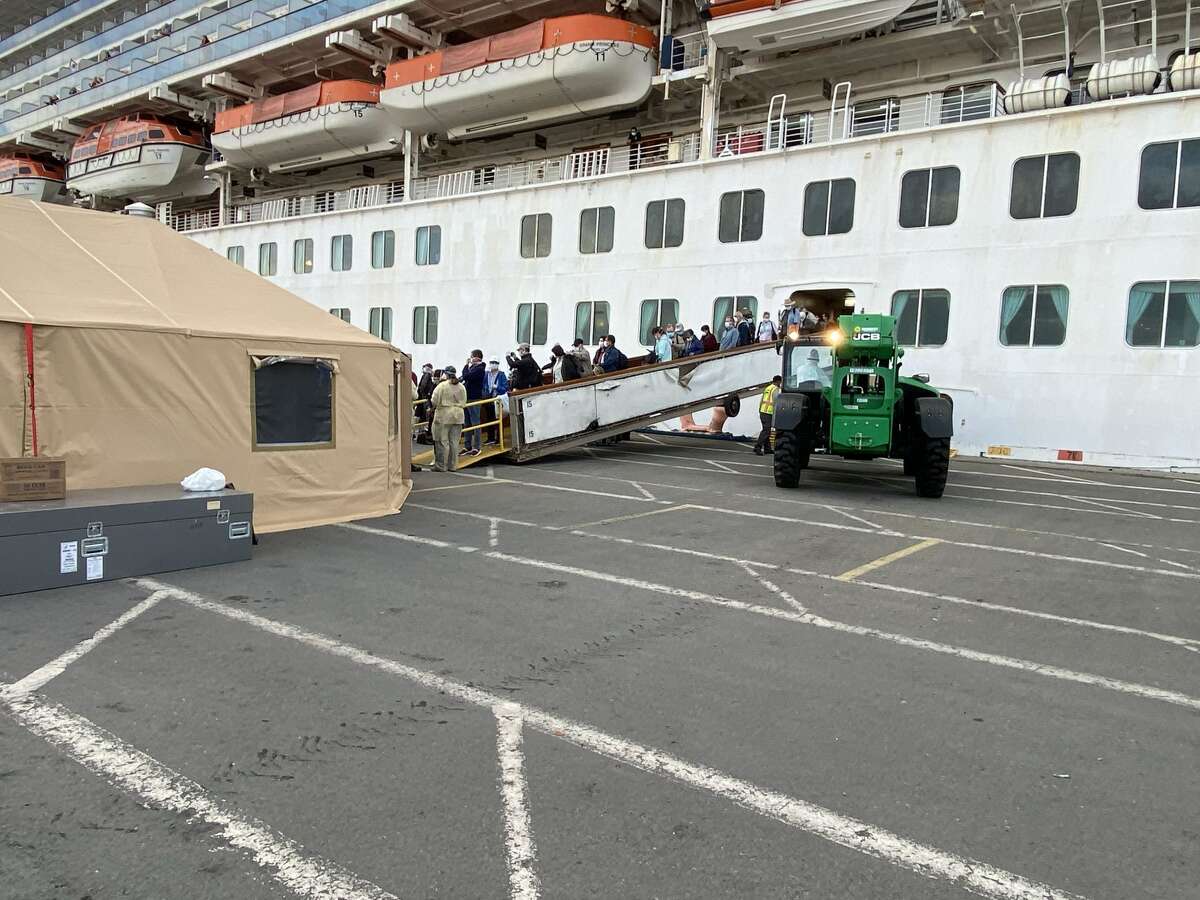 Cruise ship passengers at Travis AFB talk about nightmare conditions