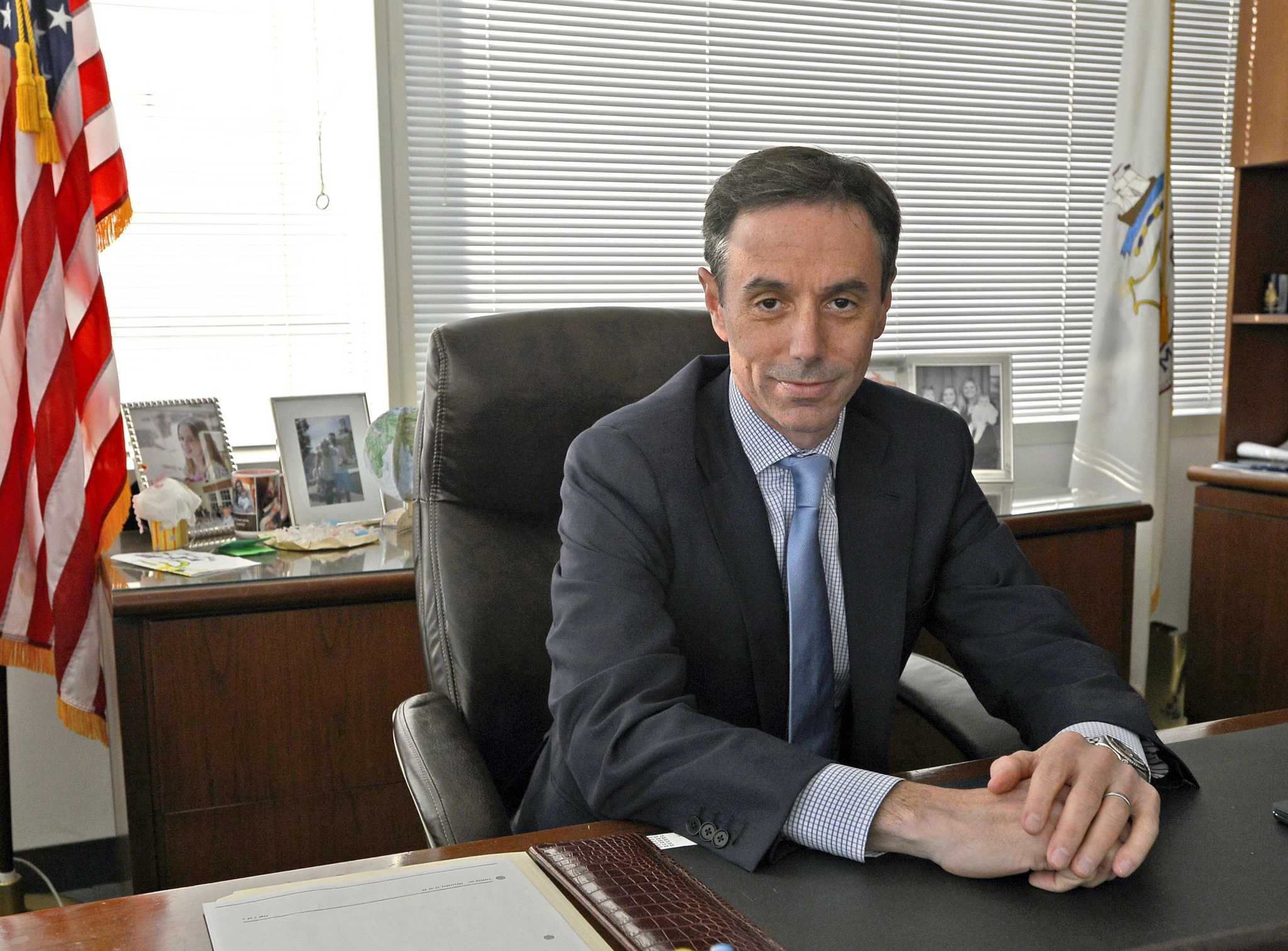 Handler out as New Canaan emergency director