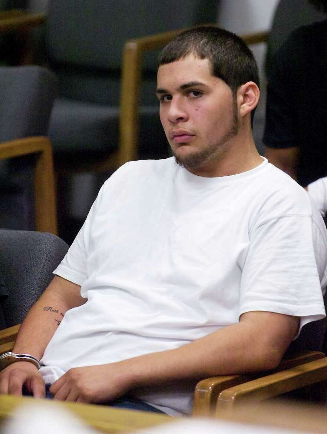 With Norwalk homicide witness mum, police file charges