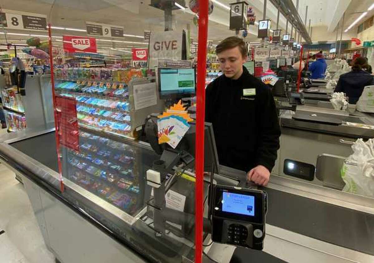 Grocery store chains installing barriers between customers, employees ...