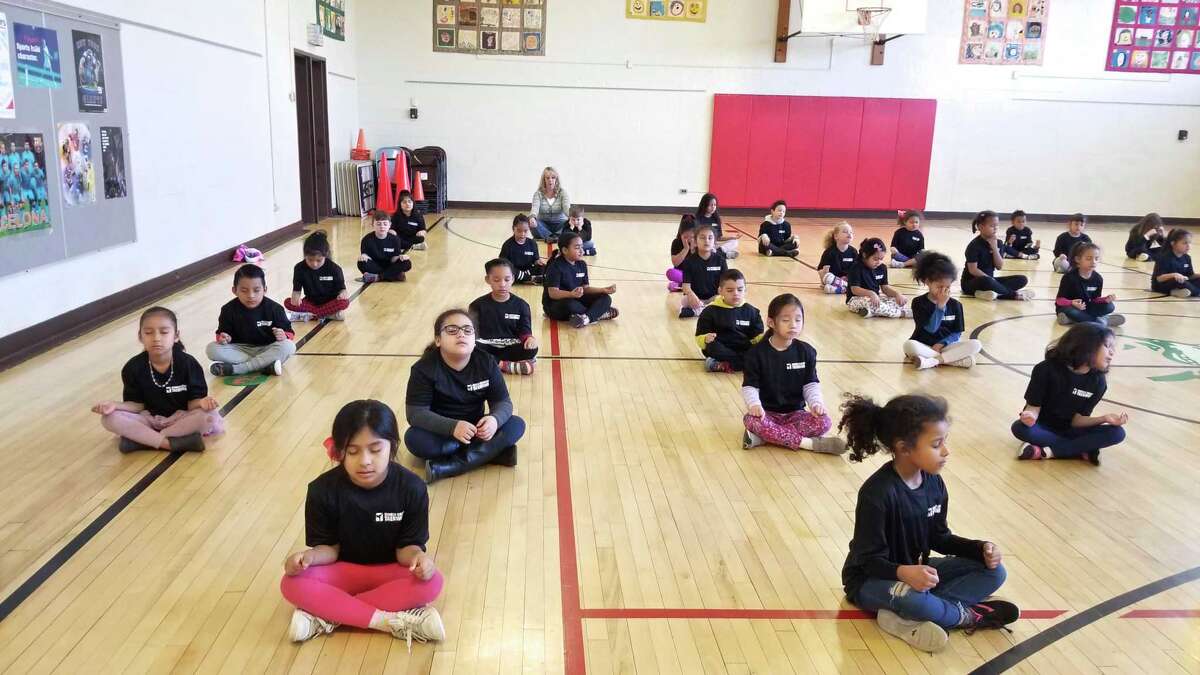 Danbury first-graders learn Taekwondo