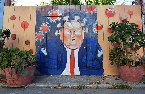 SF artist painted a mural of Trump turning into COVID-19. Then the ...