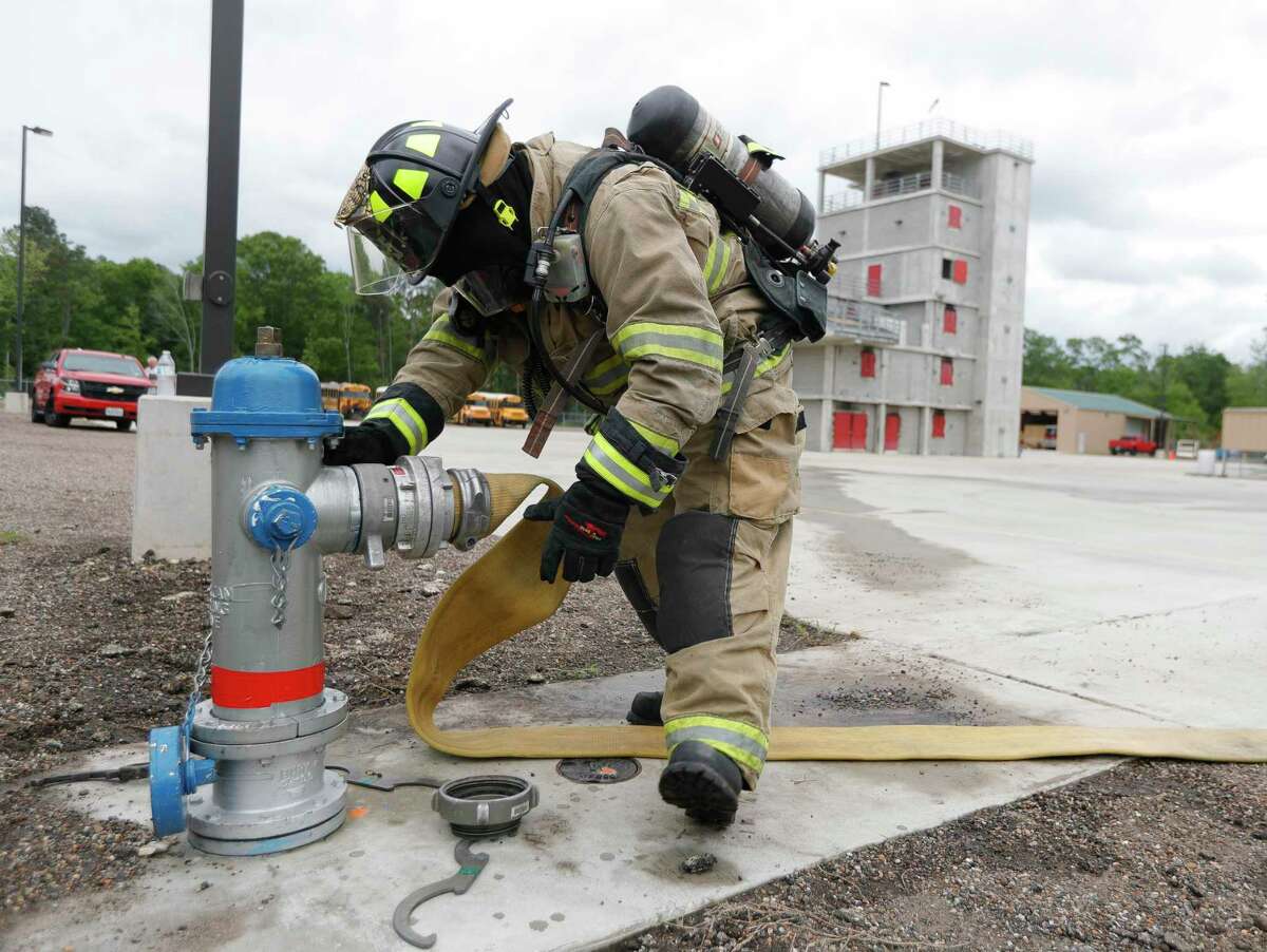 Conroe firefighters stay safe, protected while working under ...