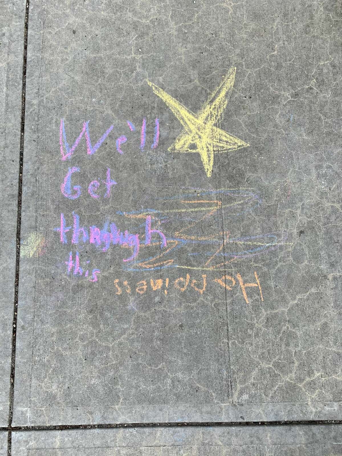 Photos: Street art offers words of encouragement during coronavirus ...