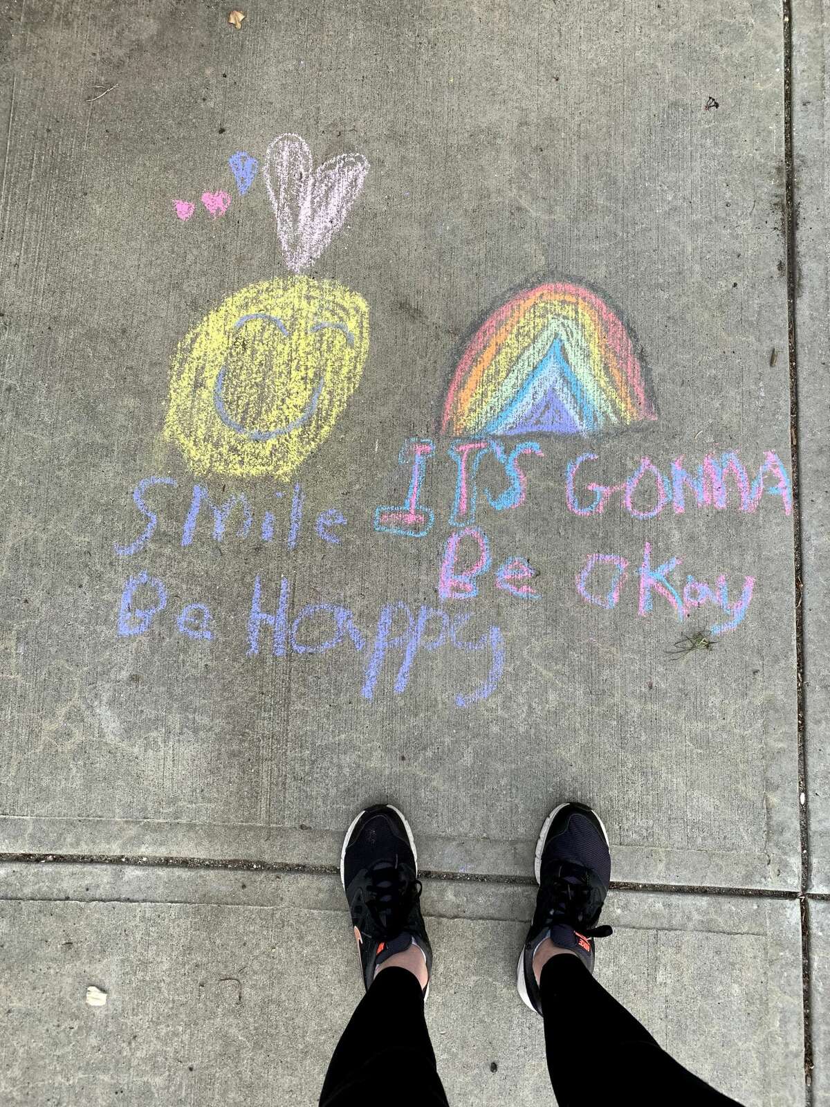 Photos: Street art offers words of encouragement during coronavirus ...