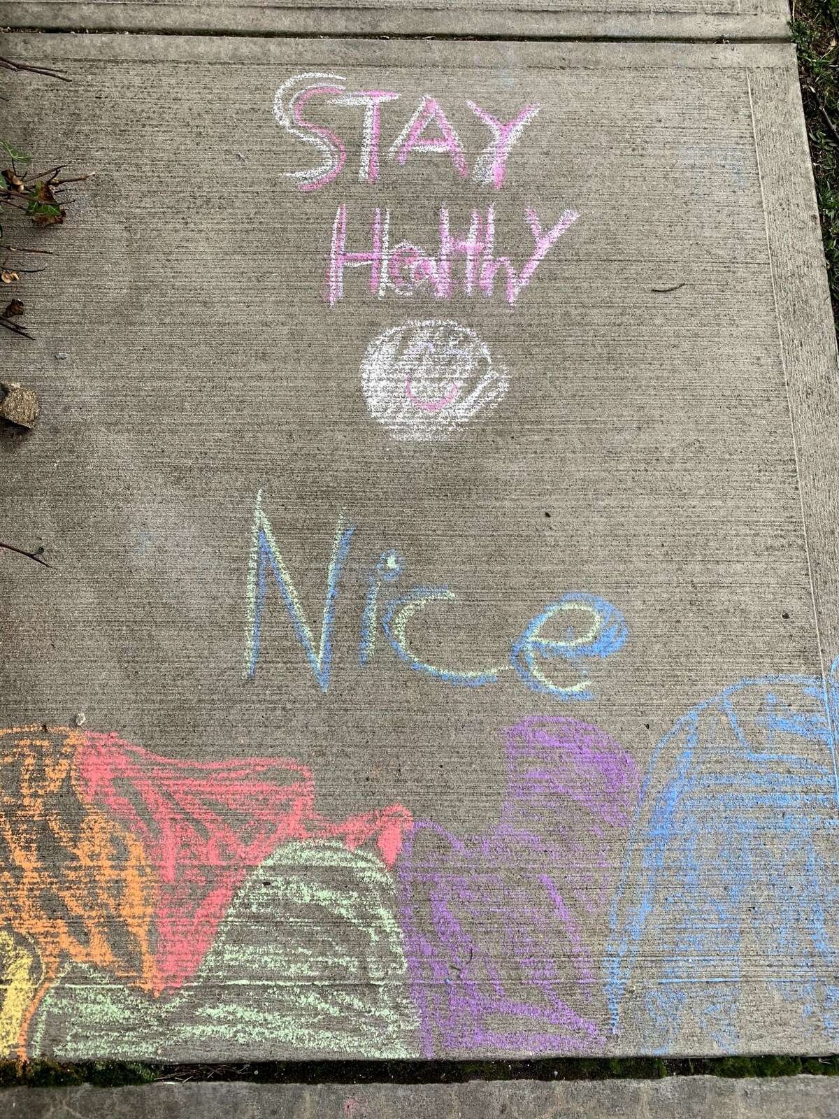 Photos: Street art offers words of encouragement during coronavirus ...