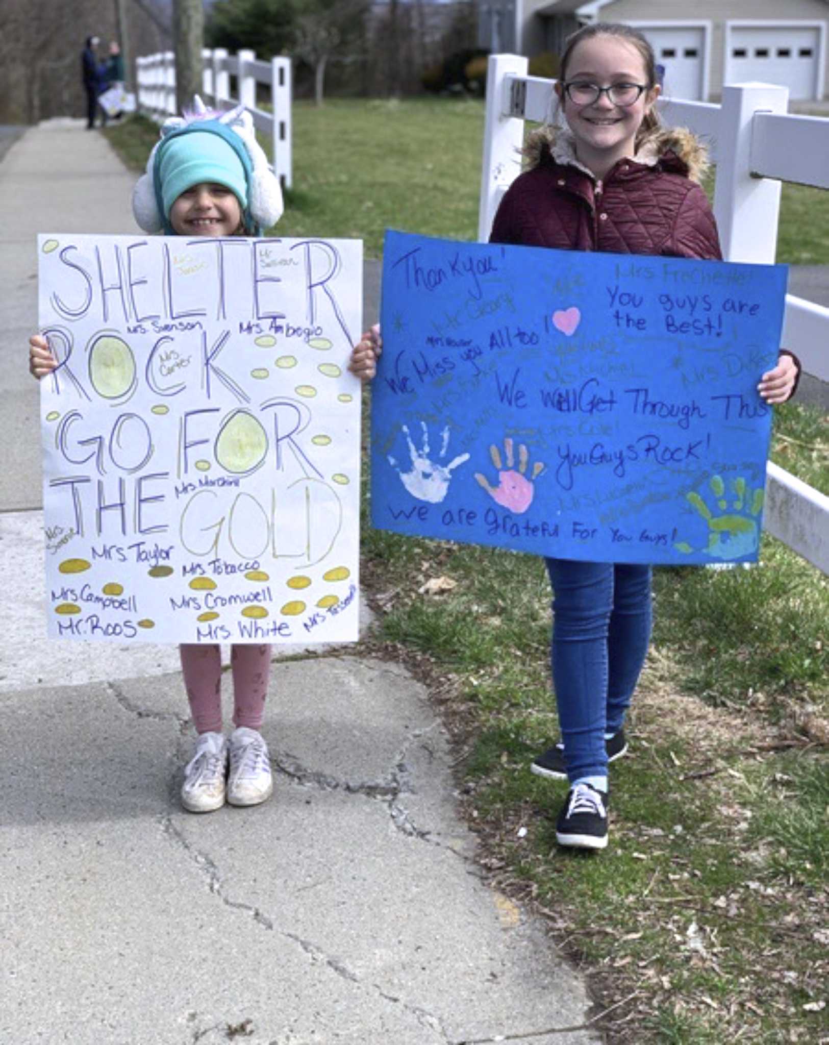 Danbury teachers hold car parade to see students