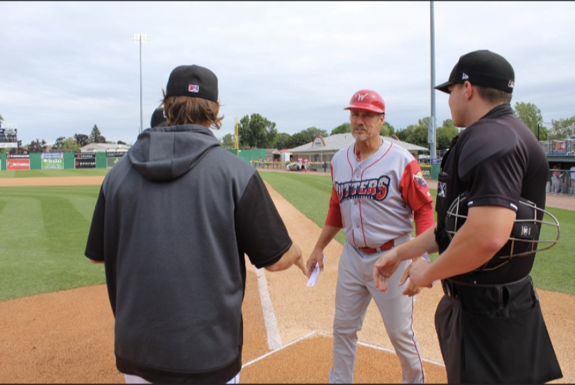 Local umpire waits for teams to play ball