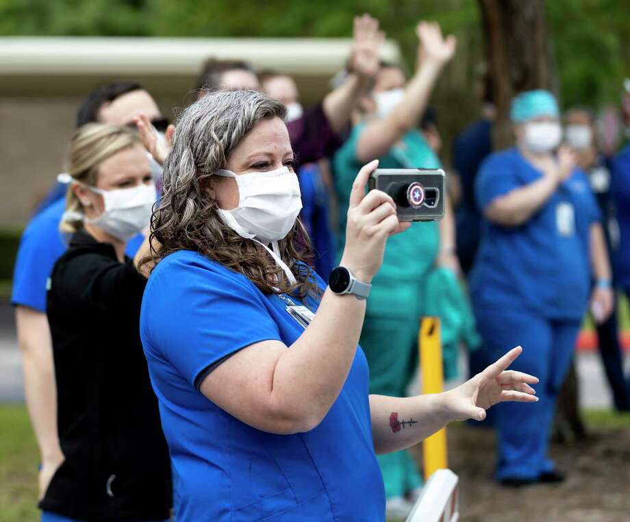 Dozens surround Conroe hospital in prayer and support for staff - The ...