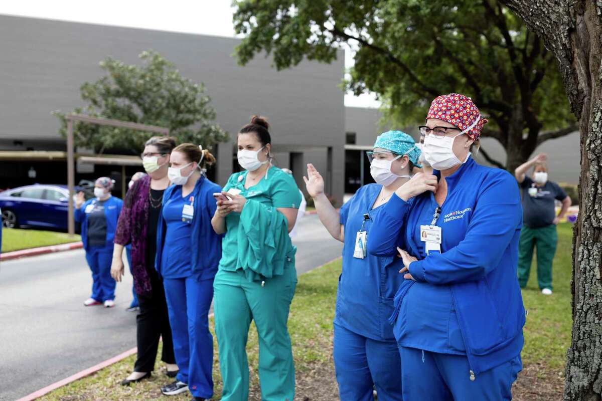 Dozens surround Conroe hospital in prayer and support for staff