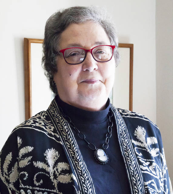 Nancy Berry ministering to others | 2020 Women of Distinction